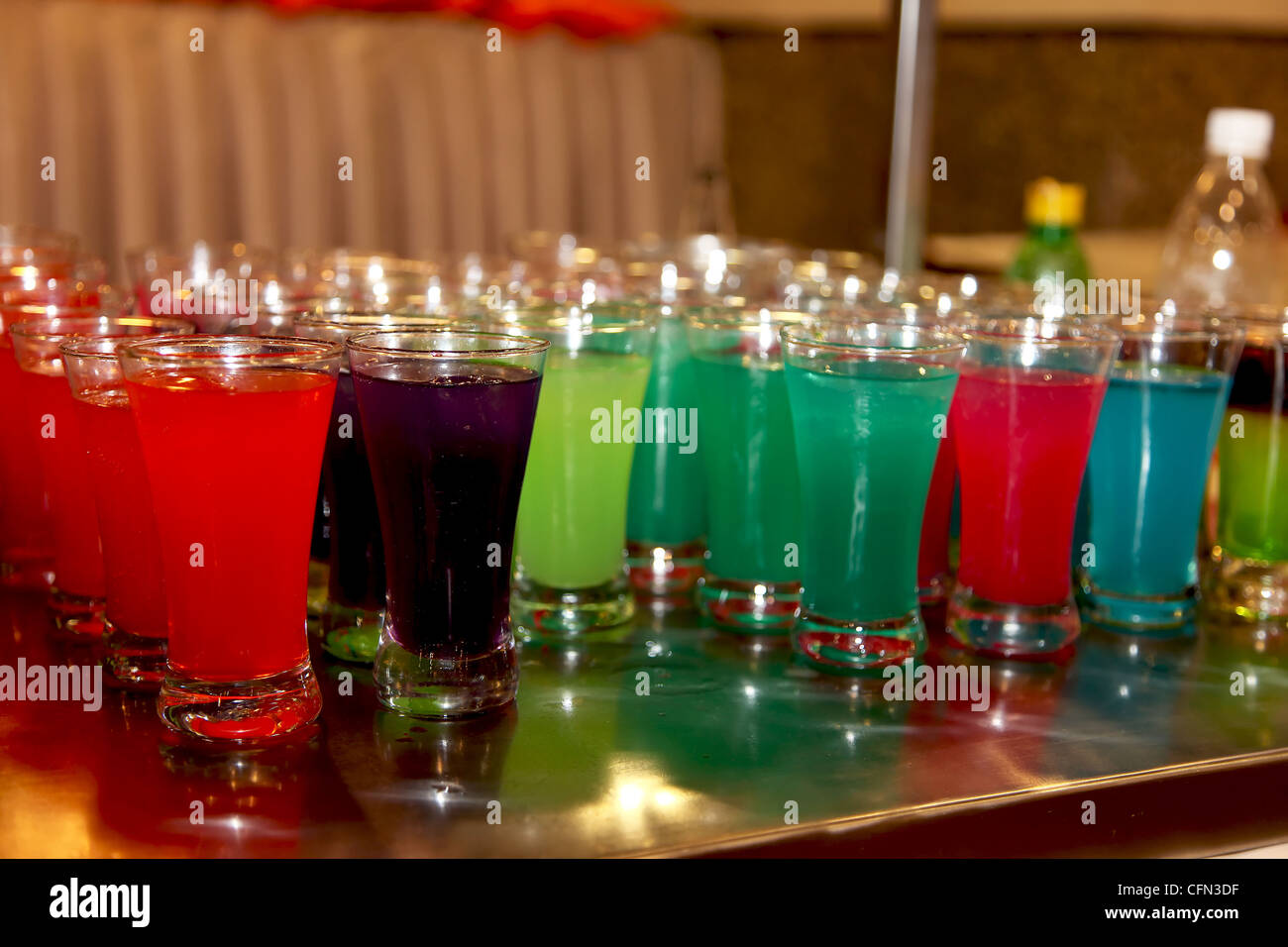 Fresh fruit juice and cold drink serving in the party Stock Photo - Alamy