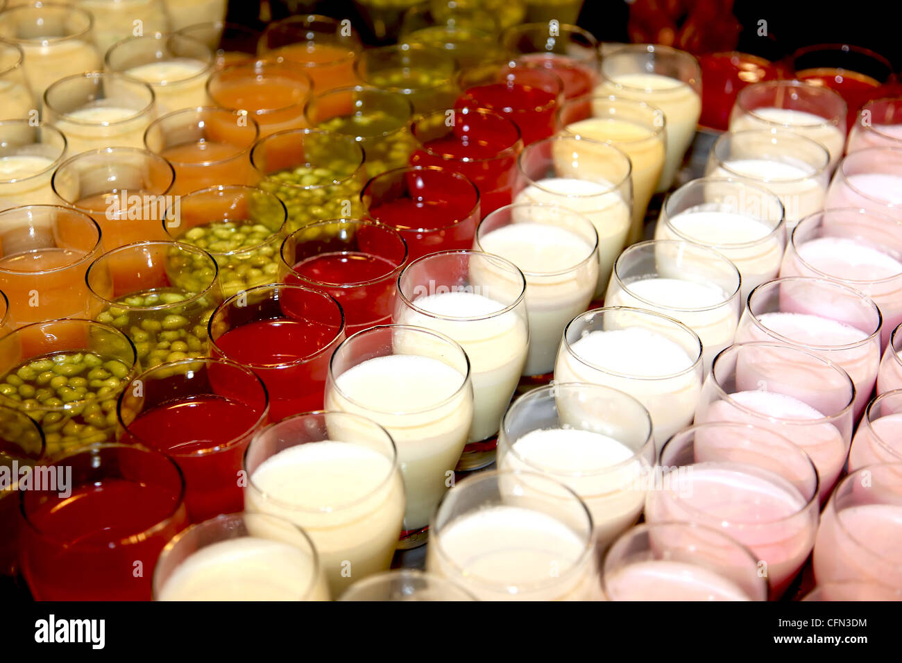 Fresh fruit juice and cold drink serving in the party Stock Photo - Alamy