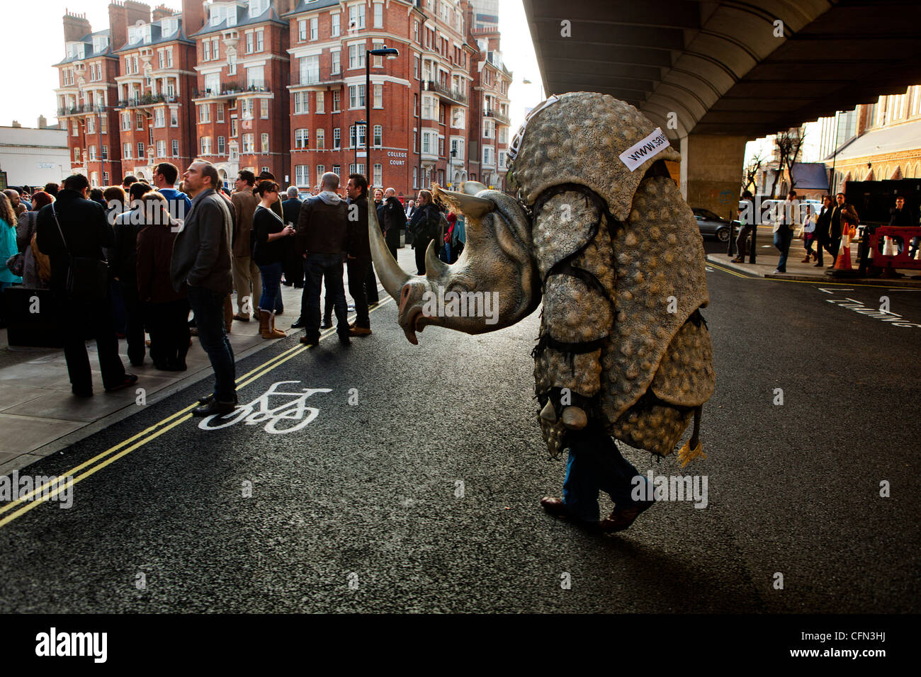 man dressed in rhino costume standing outside the Hammersmith Apollo ...
