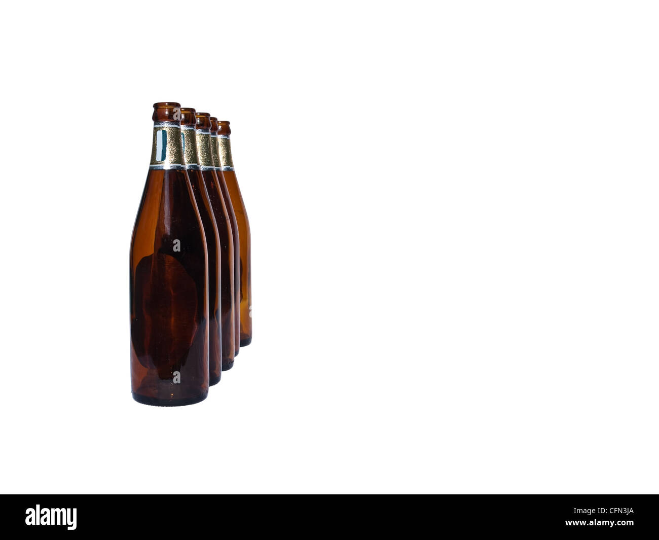 Empty beer bottles isolated over white background Stock Photo - Alamy