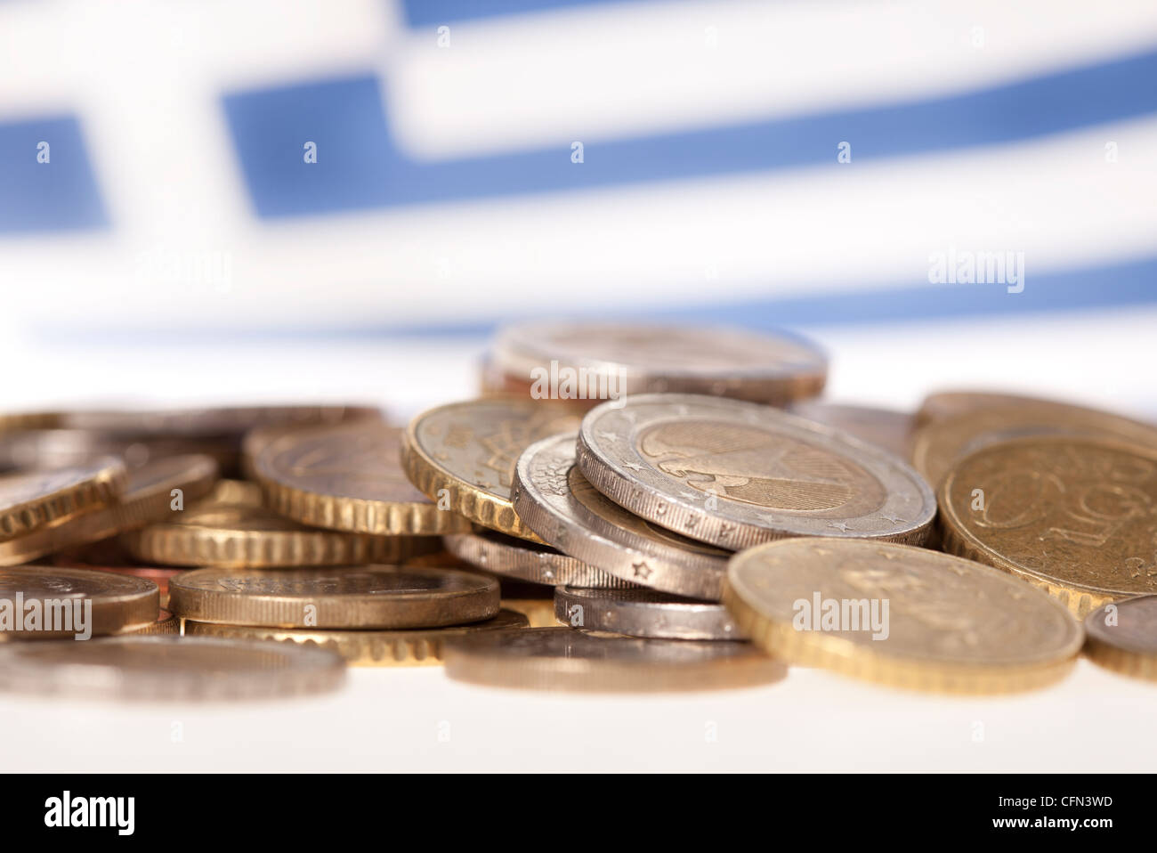 Many euro coins isolated on white background Stock Photo - Alamy