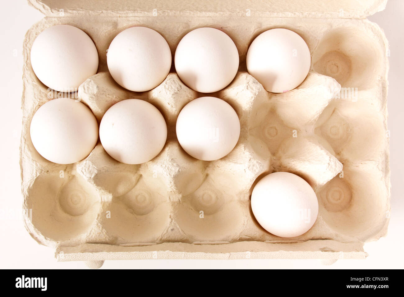 Eggs in a carton Stock Photo - Alamy
