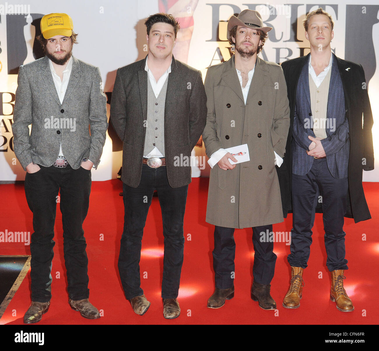 Ted Dwane, Ben Lovett, Marcus Mumford and Winston Marshall of the band ...