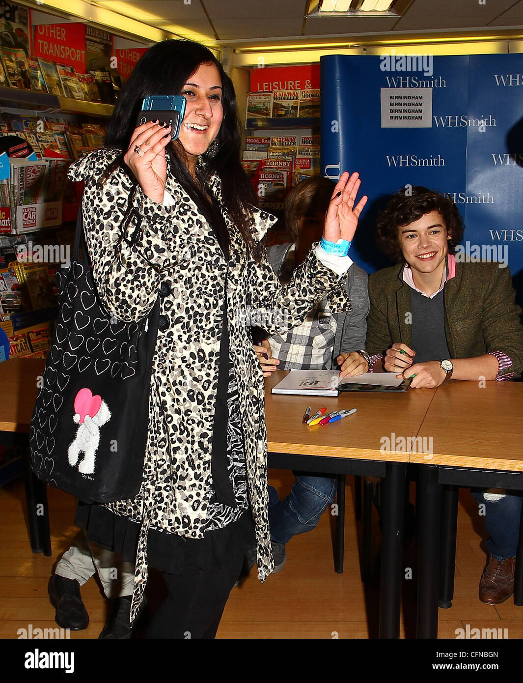 Harry styles one direction signing hi-res stock photography and images ...