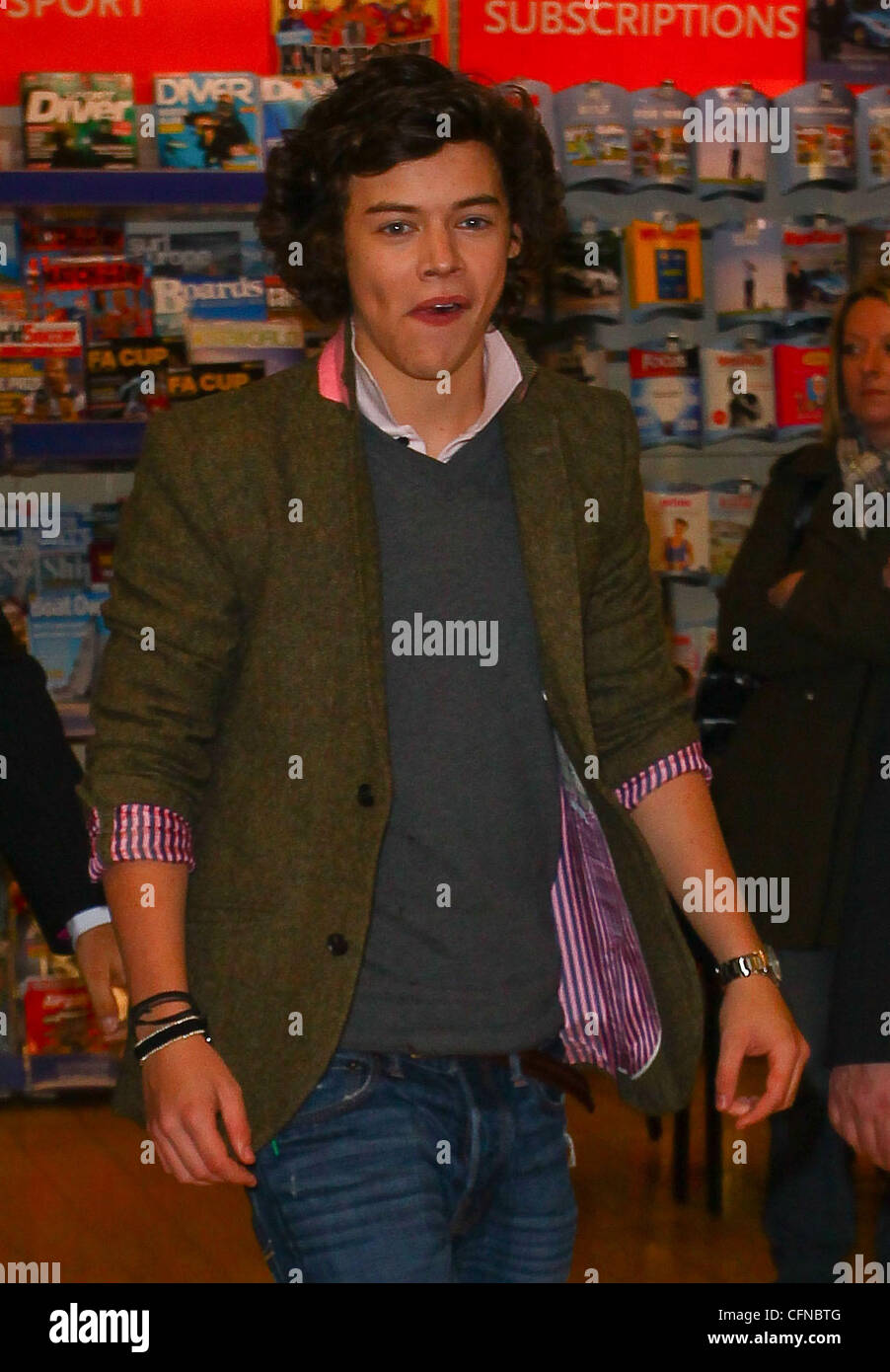 Harry Styles 'One Direction' promoting and signing copies of their new ...