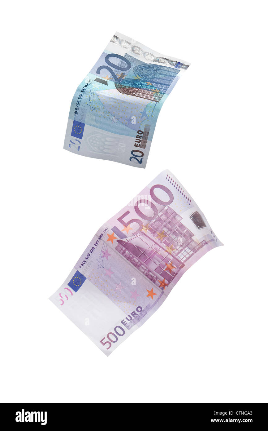 Two euro bills falling on white background Stock Photo - Alamy
