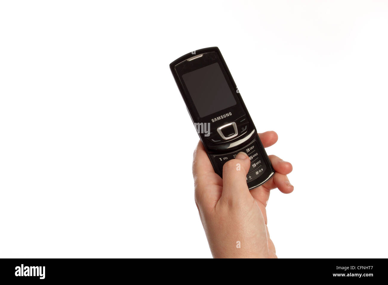 Holding texting on mobile Cut Out Stock Images & Pictures - Alamy