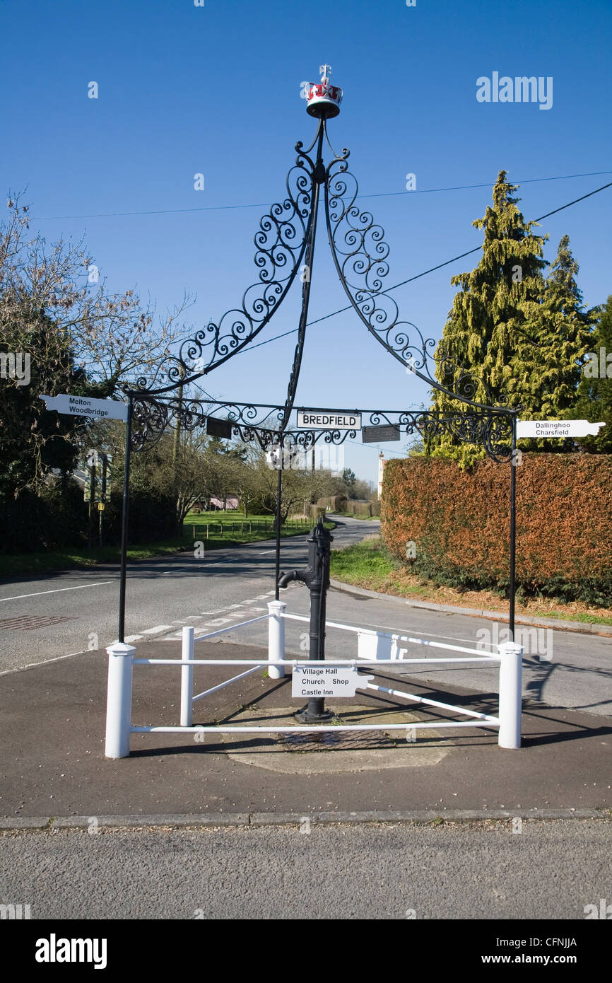 Ornate village metal signpost with pump, Bredfield, Suffolk, England ...