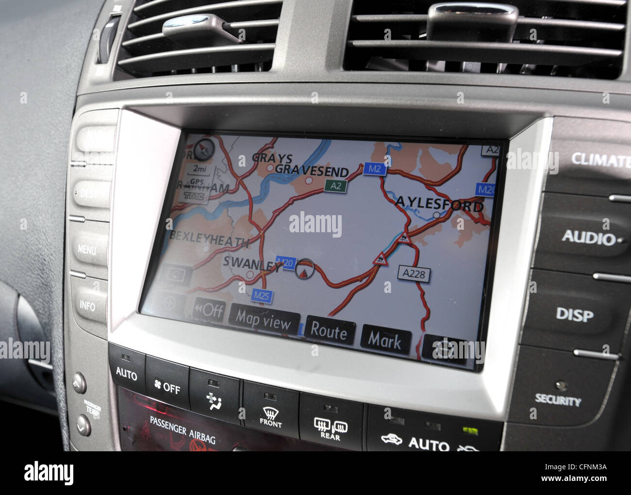 Satellite navigation in a car dashboard - built in screen in a Lexus IS ...