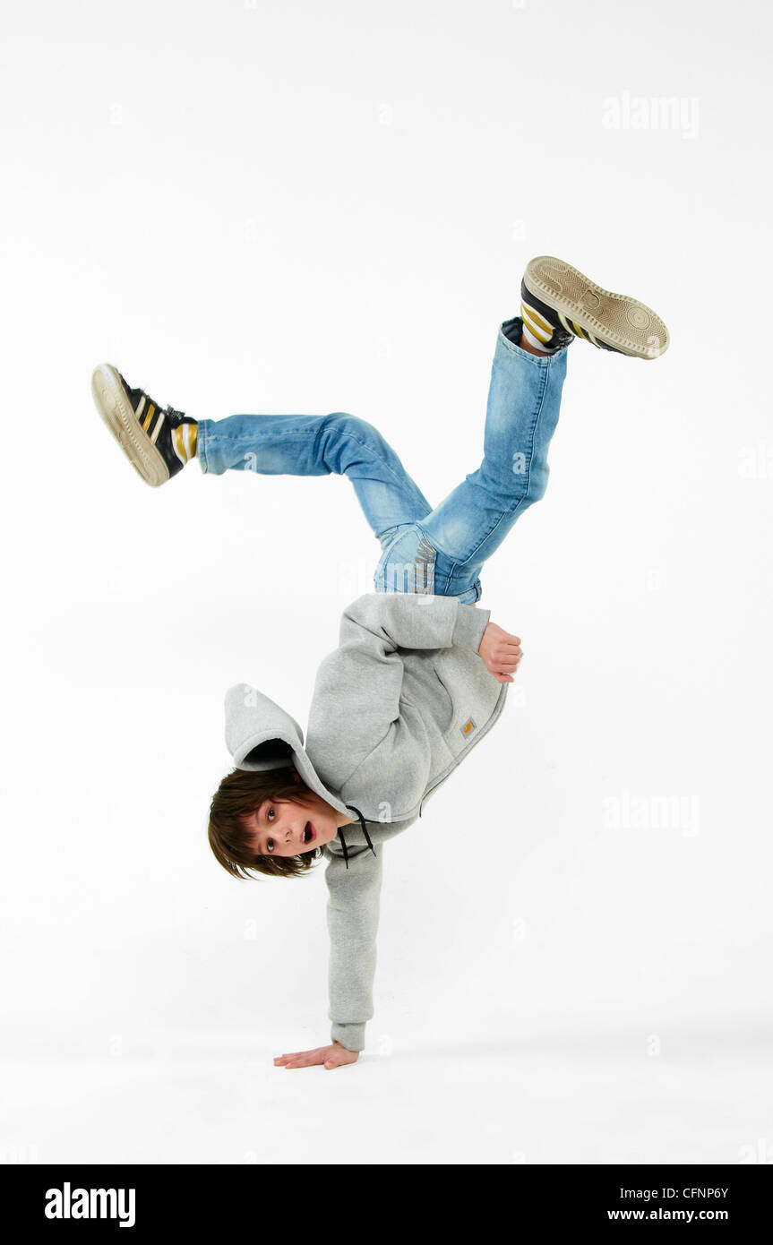 boy dancing break dance on a white background Stock Photo - Alamy