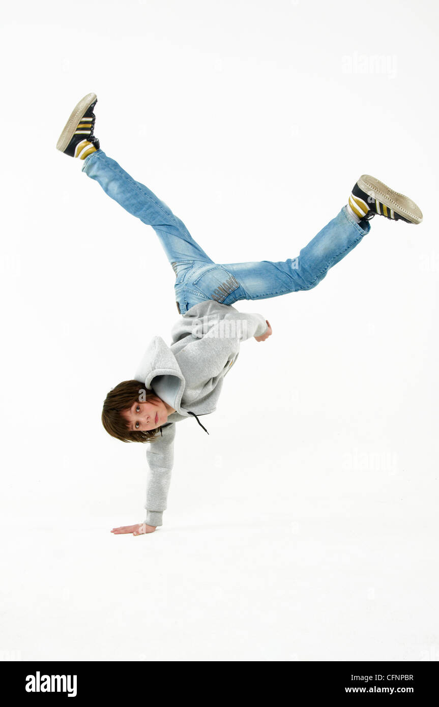 boy dancing break dance on a white background Stock Photo - Alamy
