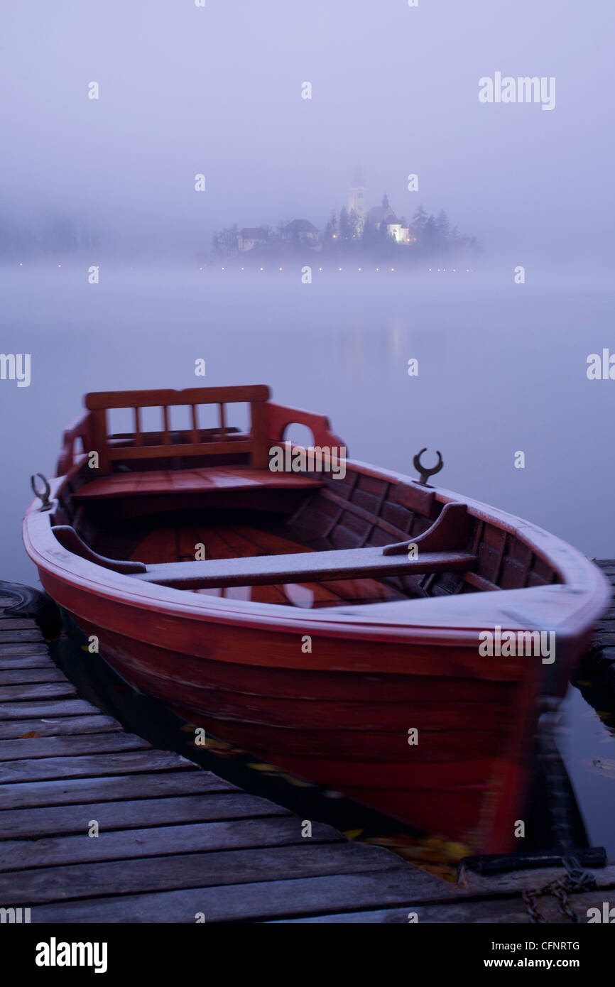 The famous Island church enshrouded in an icy mist and frost over Lake ...