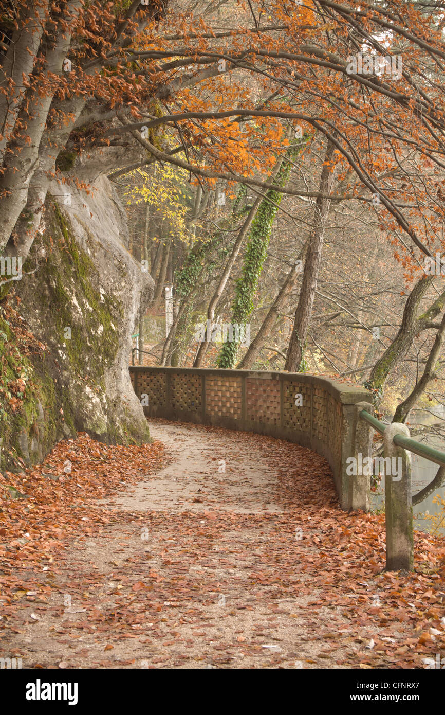 Lake Bled in Autumn. The walking path circumnavigates the entire lake ...