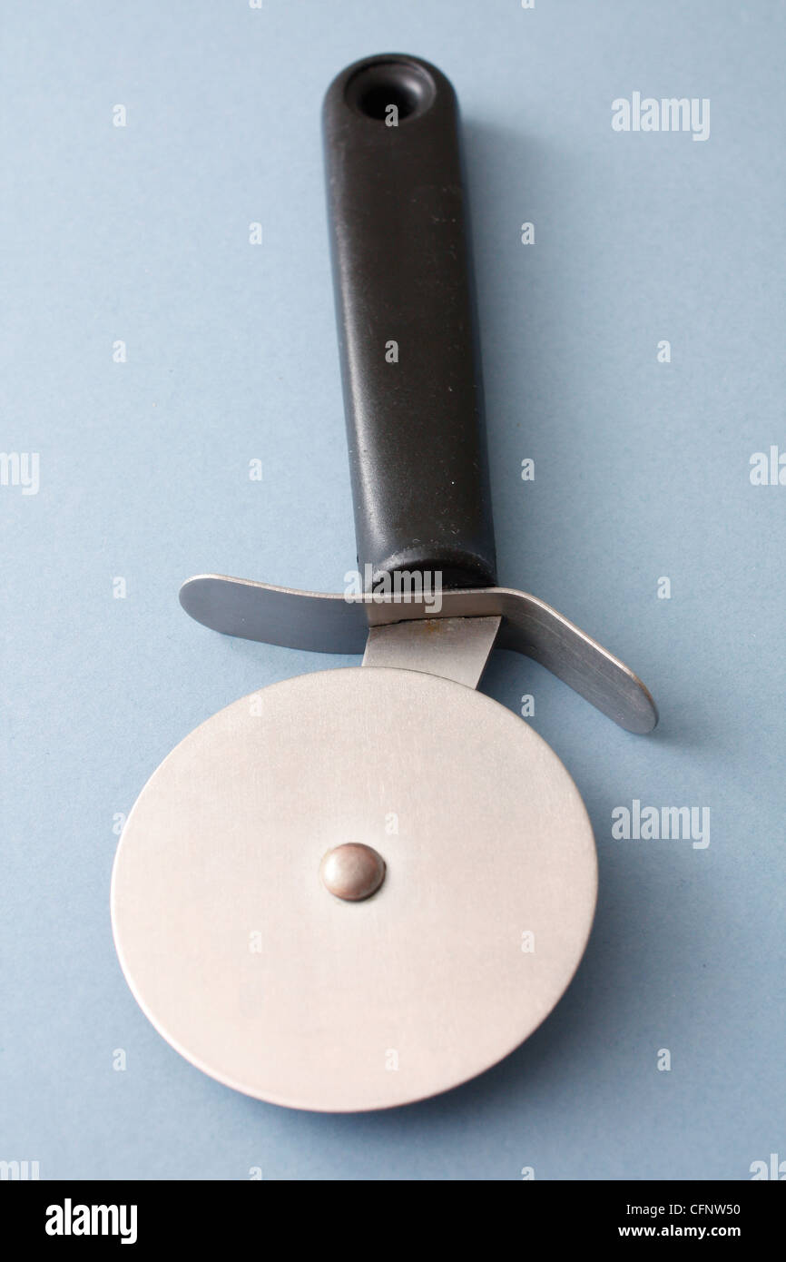 Round pizza cutter hi-res stock photography and images - Alamy