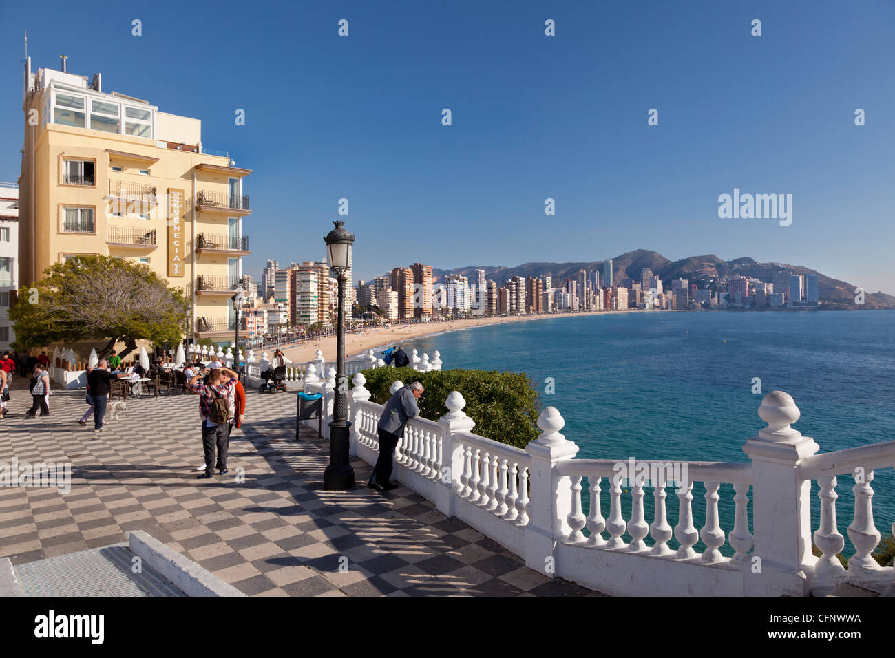 Panoramic of Benidorm's old town terrace, with people strolling in the ...