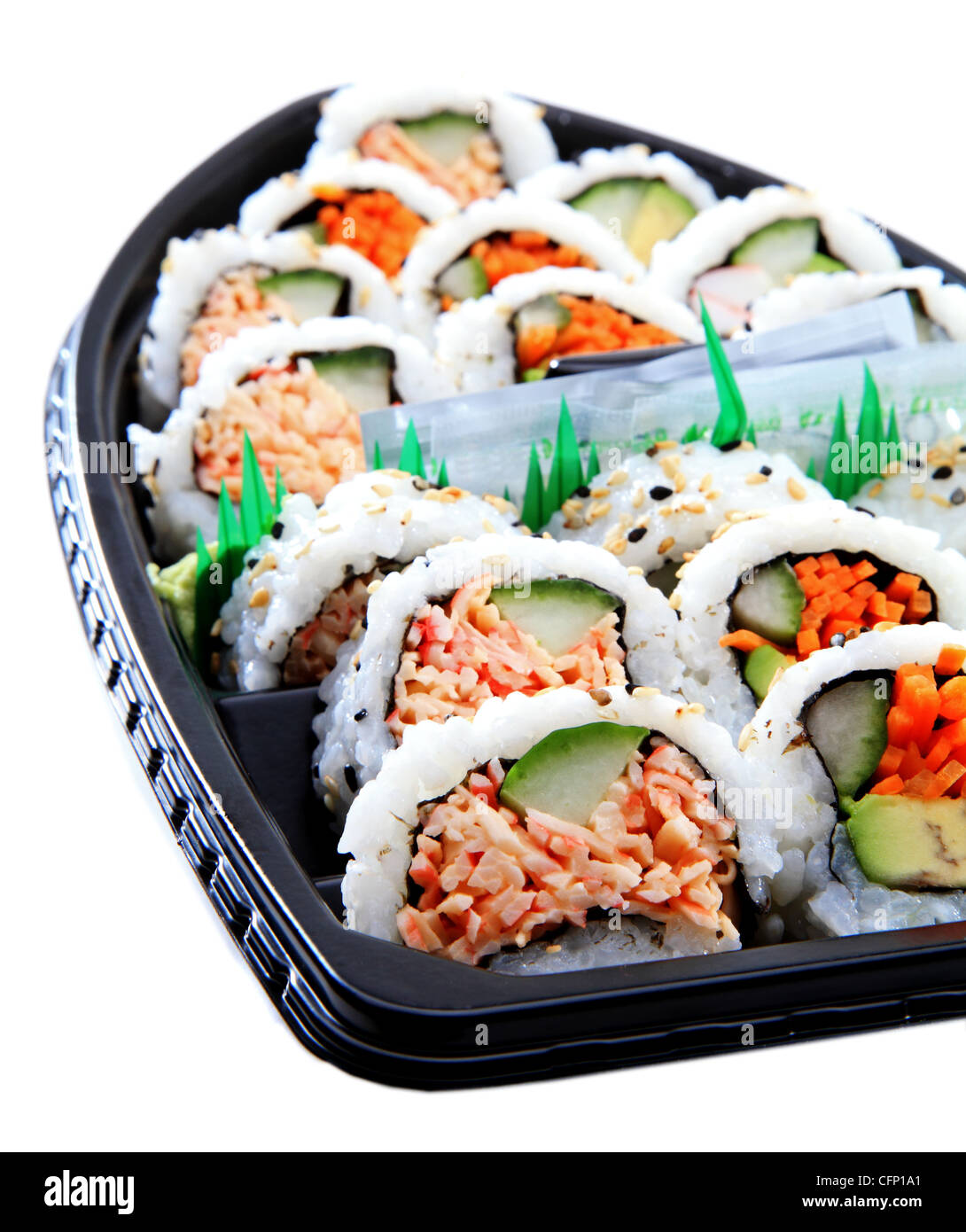 Japanese Style Sushi Boat With A Variety Of Sushi Rolls In A Plastic ...