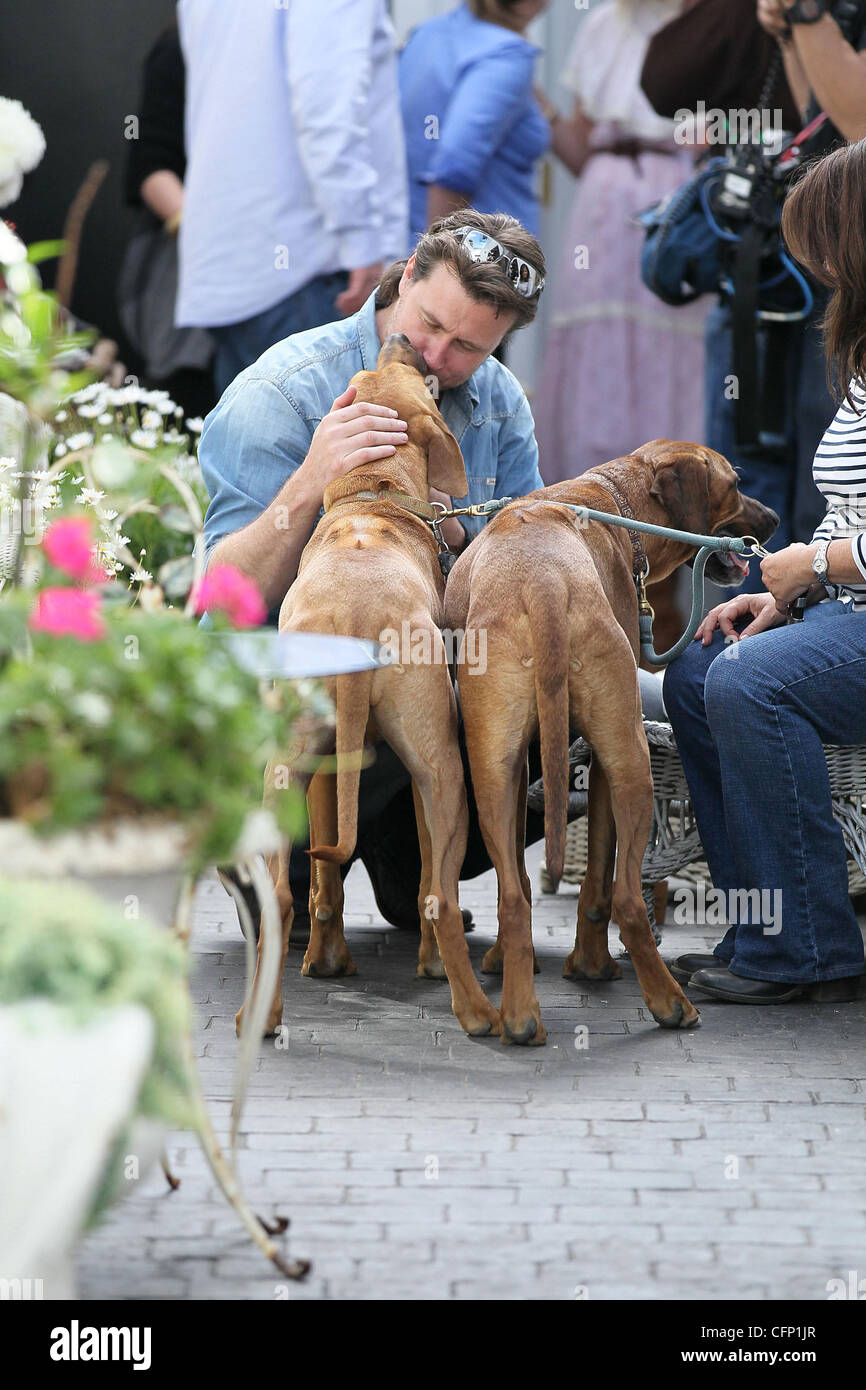 Dean McDermott meets two dogs as he films his reality show at Inventori ...
