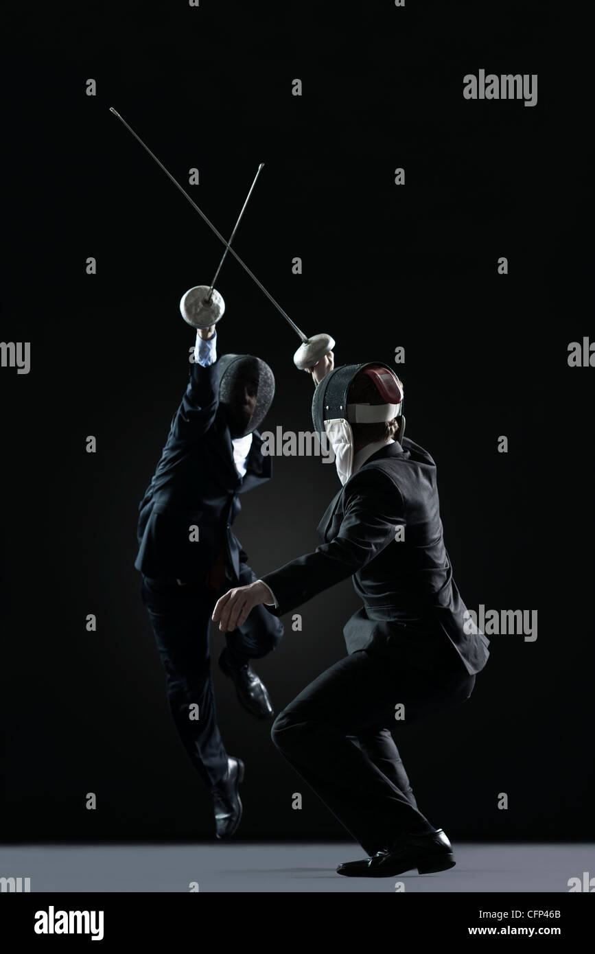 Two businessmen jumping hi-res stock photography and images - Alamy