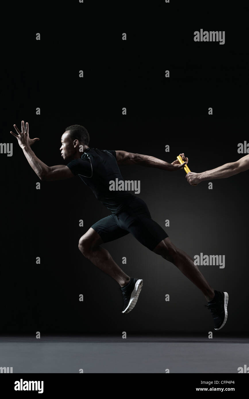 Baton exchange hi-res stock photography and images - Alamy