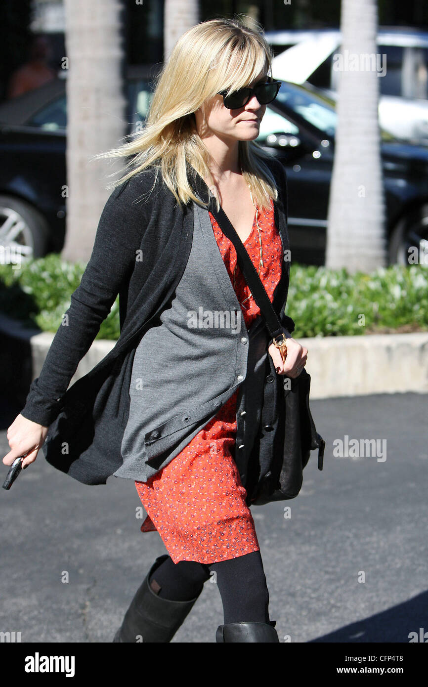 Reese Witherspoon out and about in Brentwood wearing black boots and a ...
