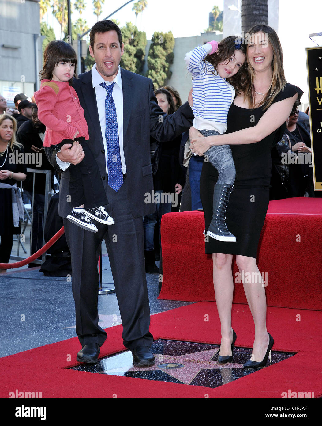 Adam Sandler with his wife Jackie and daughters Sadie and Sunny Adam ...