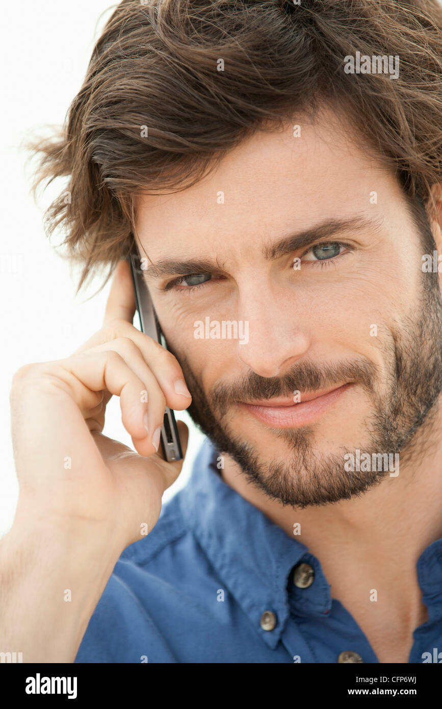 Man using cell phone, portrait Stock Photo - Alamy