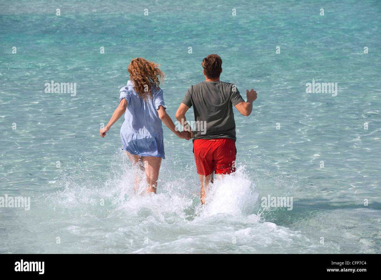 Lady holds husband hand running hi-res stock photography and images - Alamy