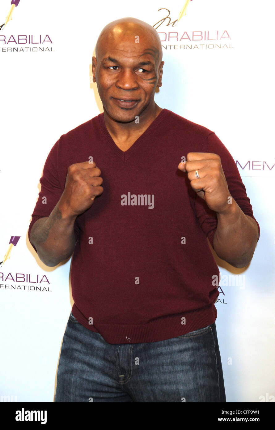 Mike Tyson attends an autograph-signing session in the Miracle Mile ...