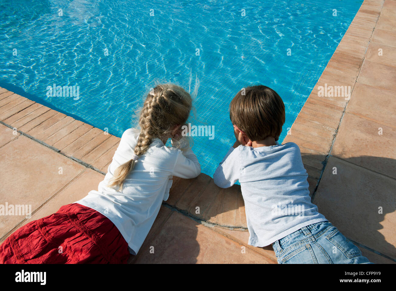 Boys Lying Pool High Resolution Stock Photography and Images - Alamy