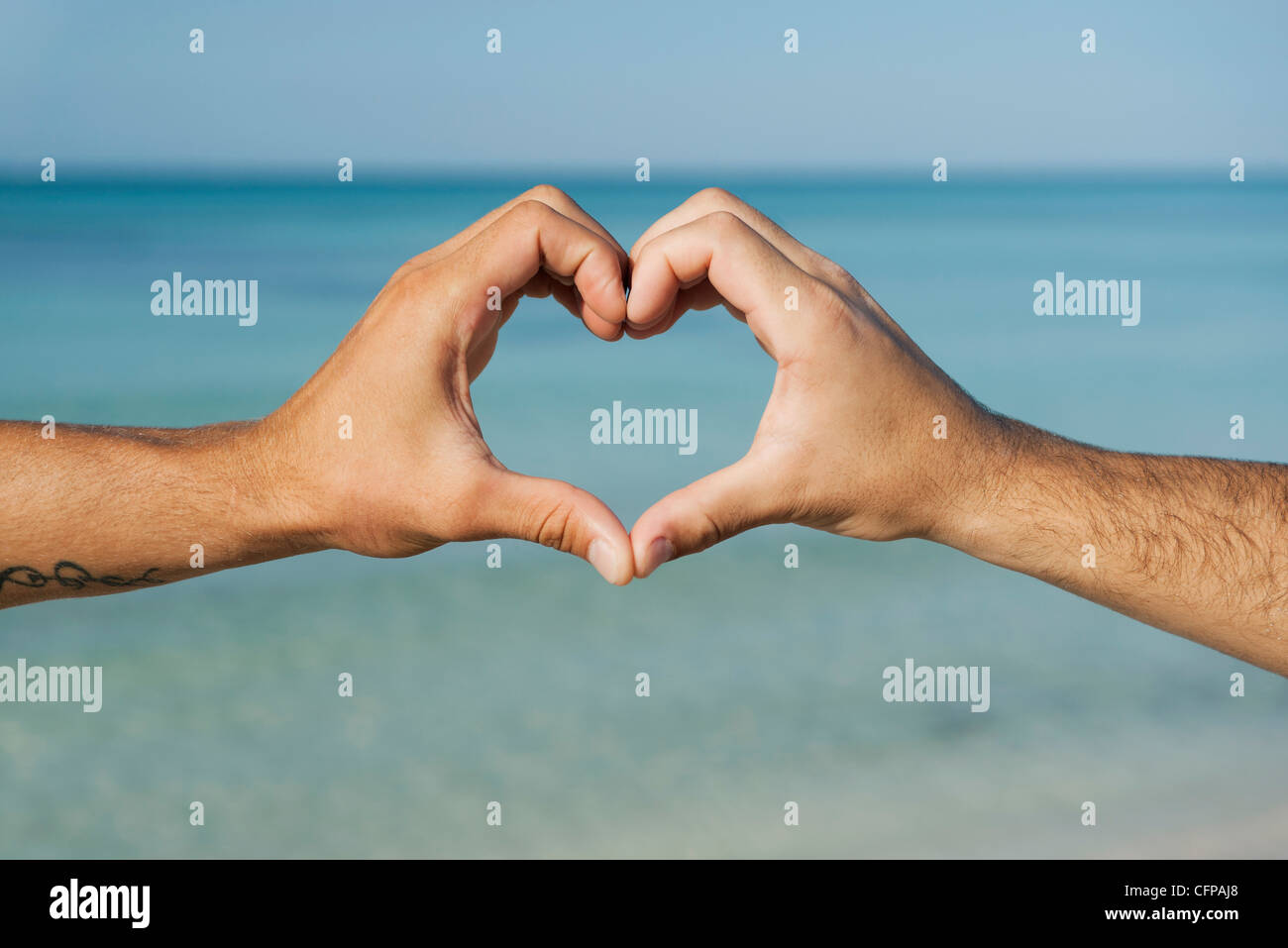 Two mens hands hi-res stock photography and images - Alamy