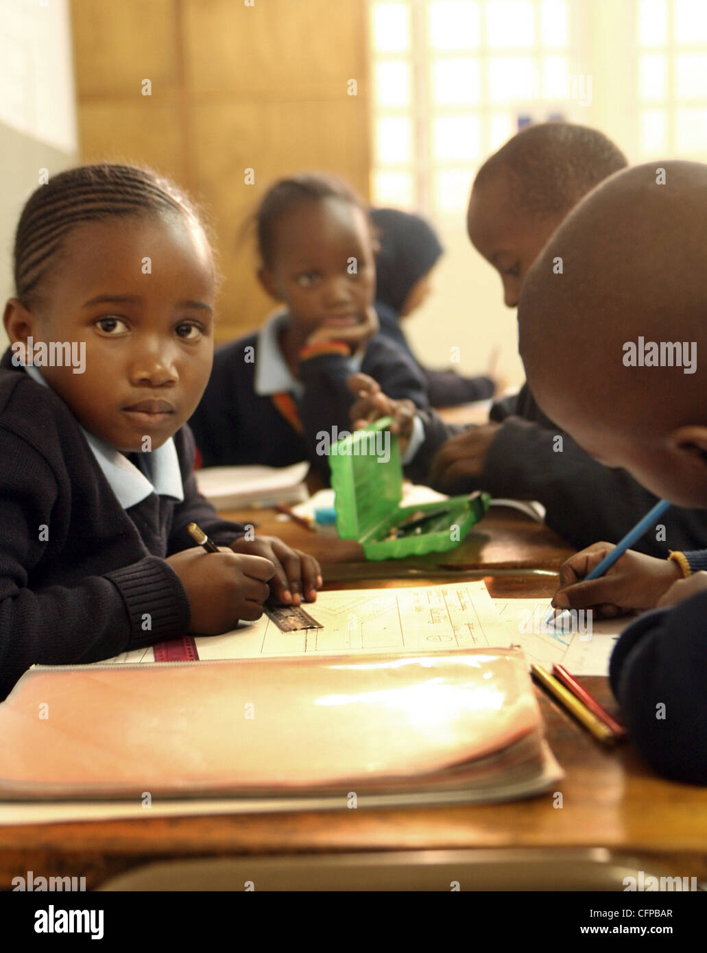 School children doing community work hi-res stock photography and ...