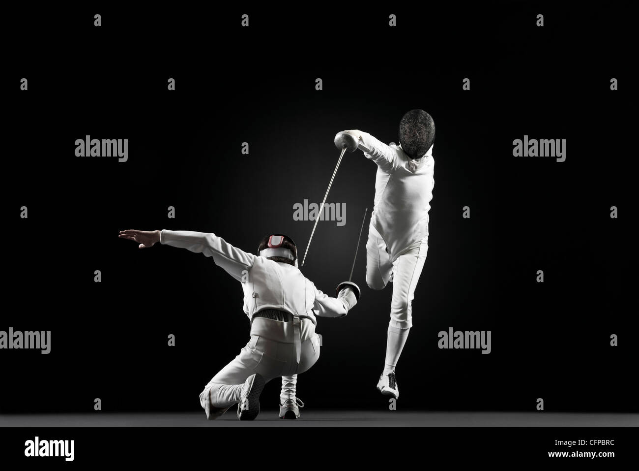 Two fencing persons hi-res stock photography and images - Alamy