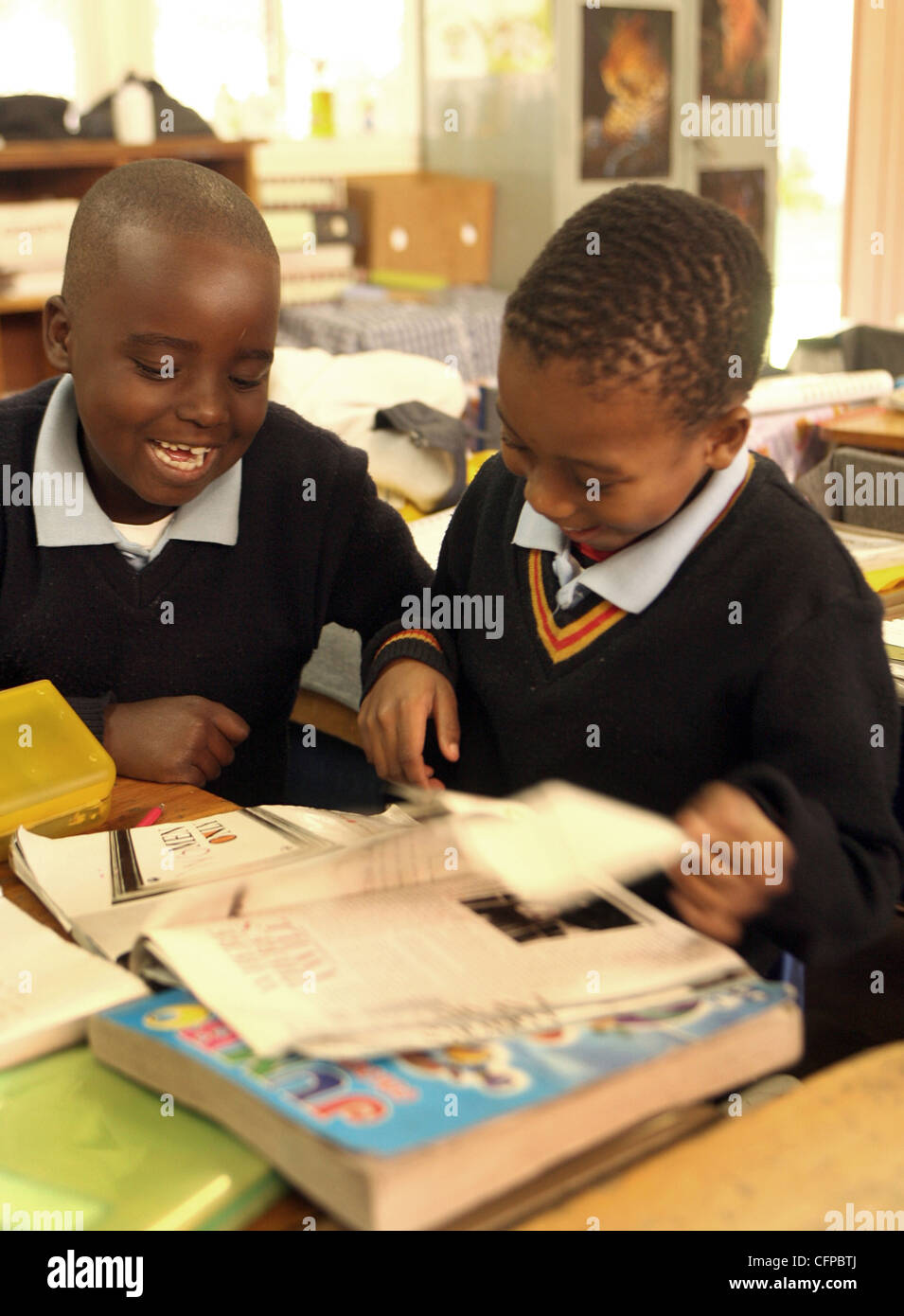 Learners doing class work at a community school in Johannesburg ...