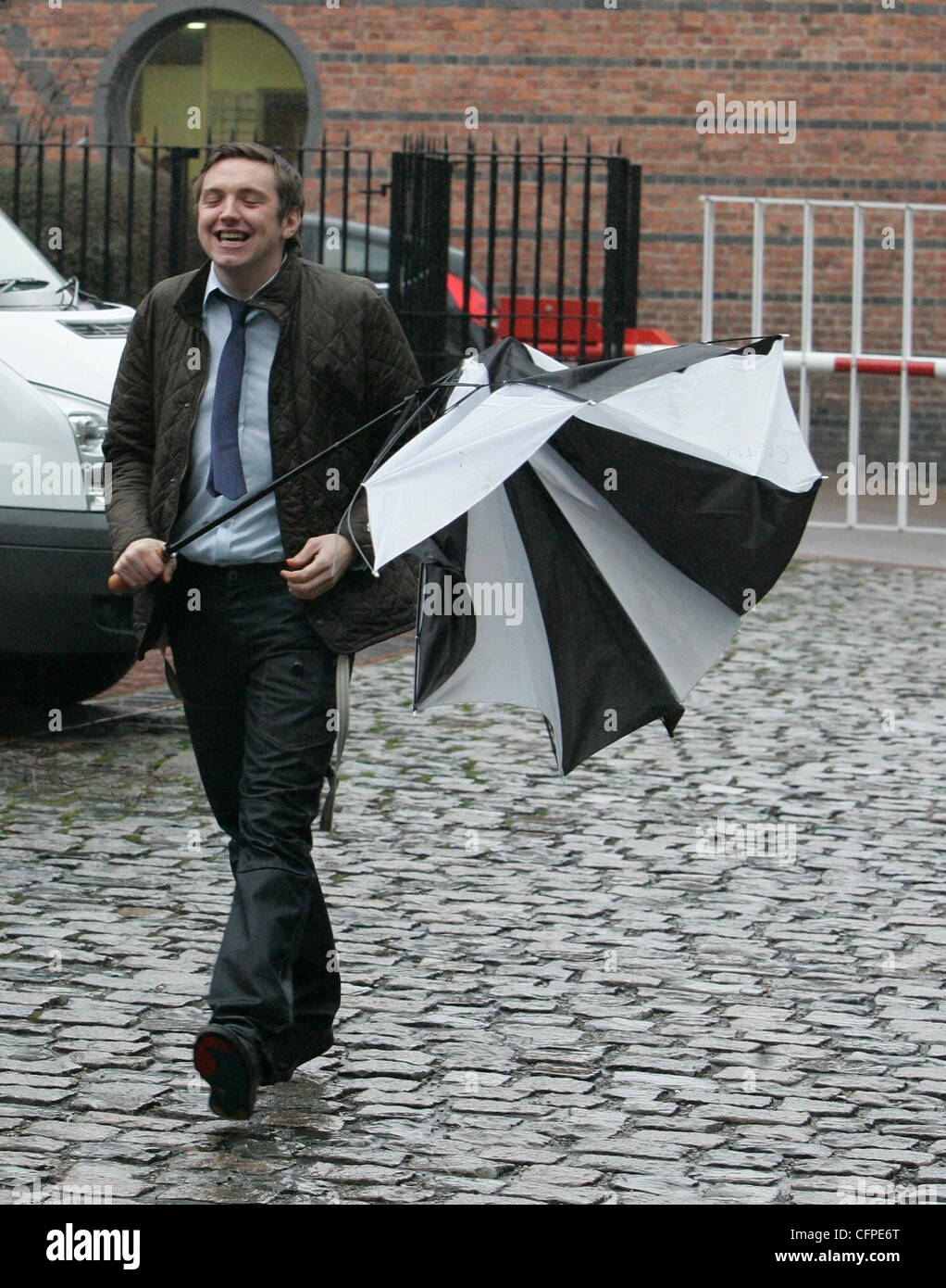 Craig Gazey has problems with his umbrella 'Coronation Street' cast ...