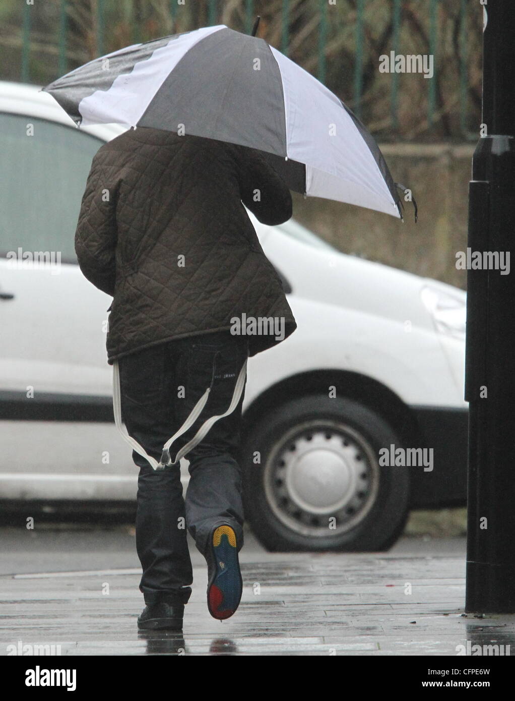 Craig Gazey has problems with his umbrella 'Coronation Street' cast ...