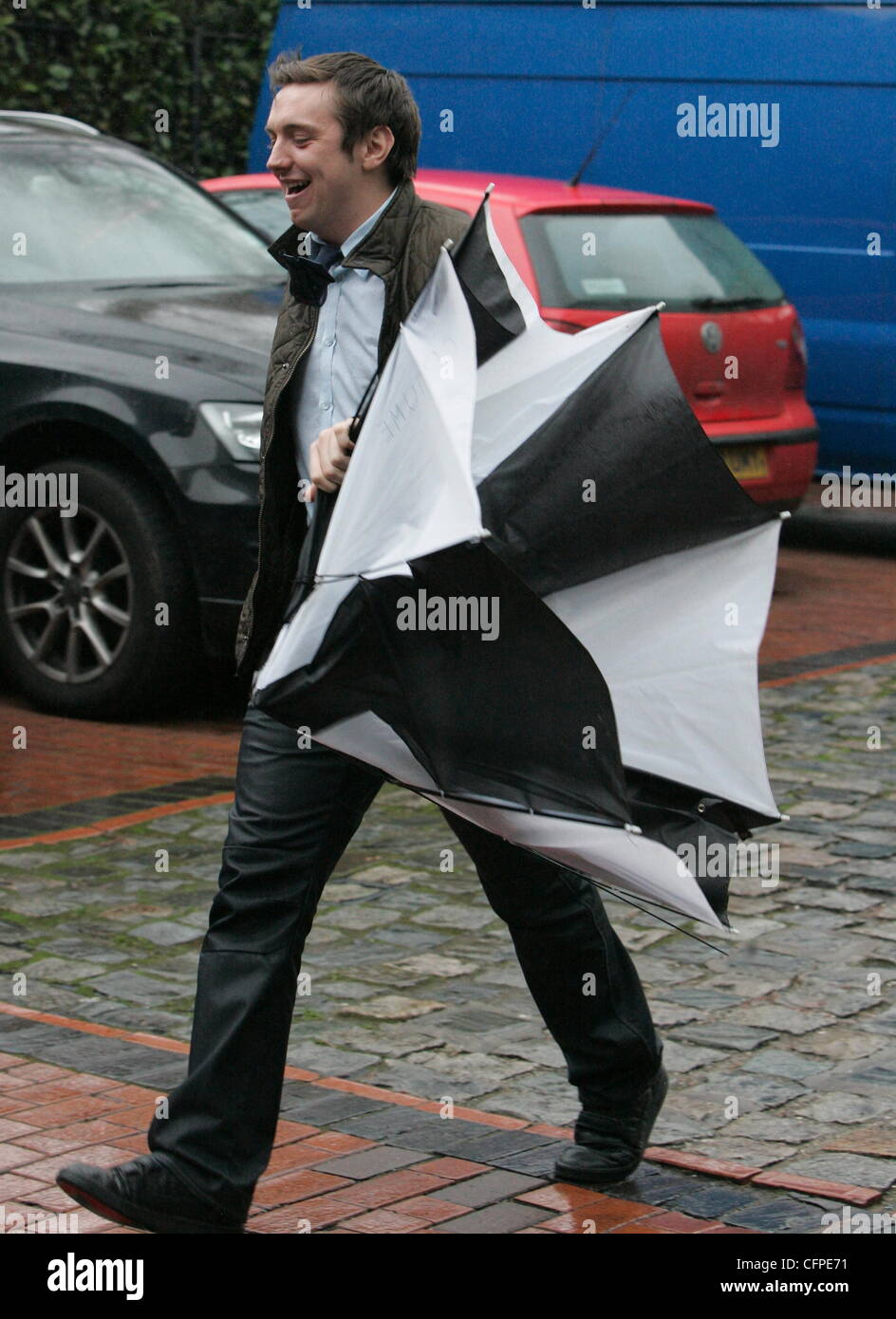 Craig Gazey has problems with his umbrella 'Coronation Street' cast ...