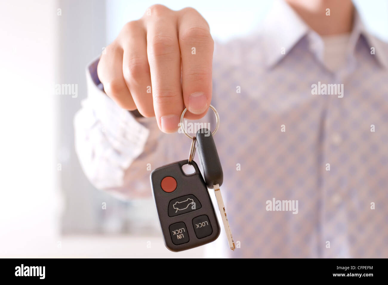 Man Offering Car Keys Stock Photo - Alamy