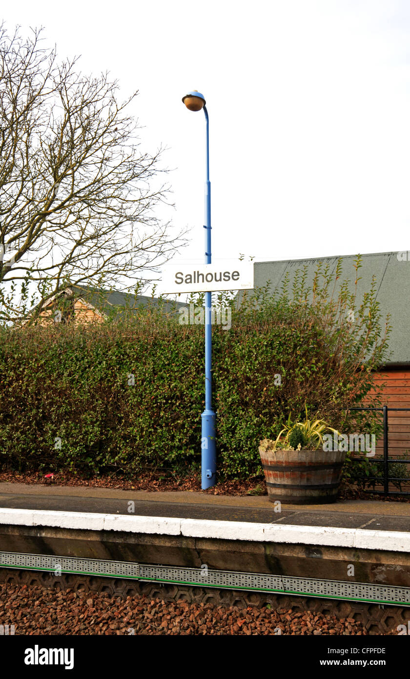 Railway station identification plate on platform lamp post at Salhouse ...