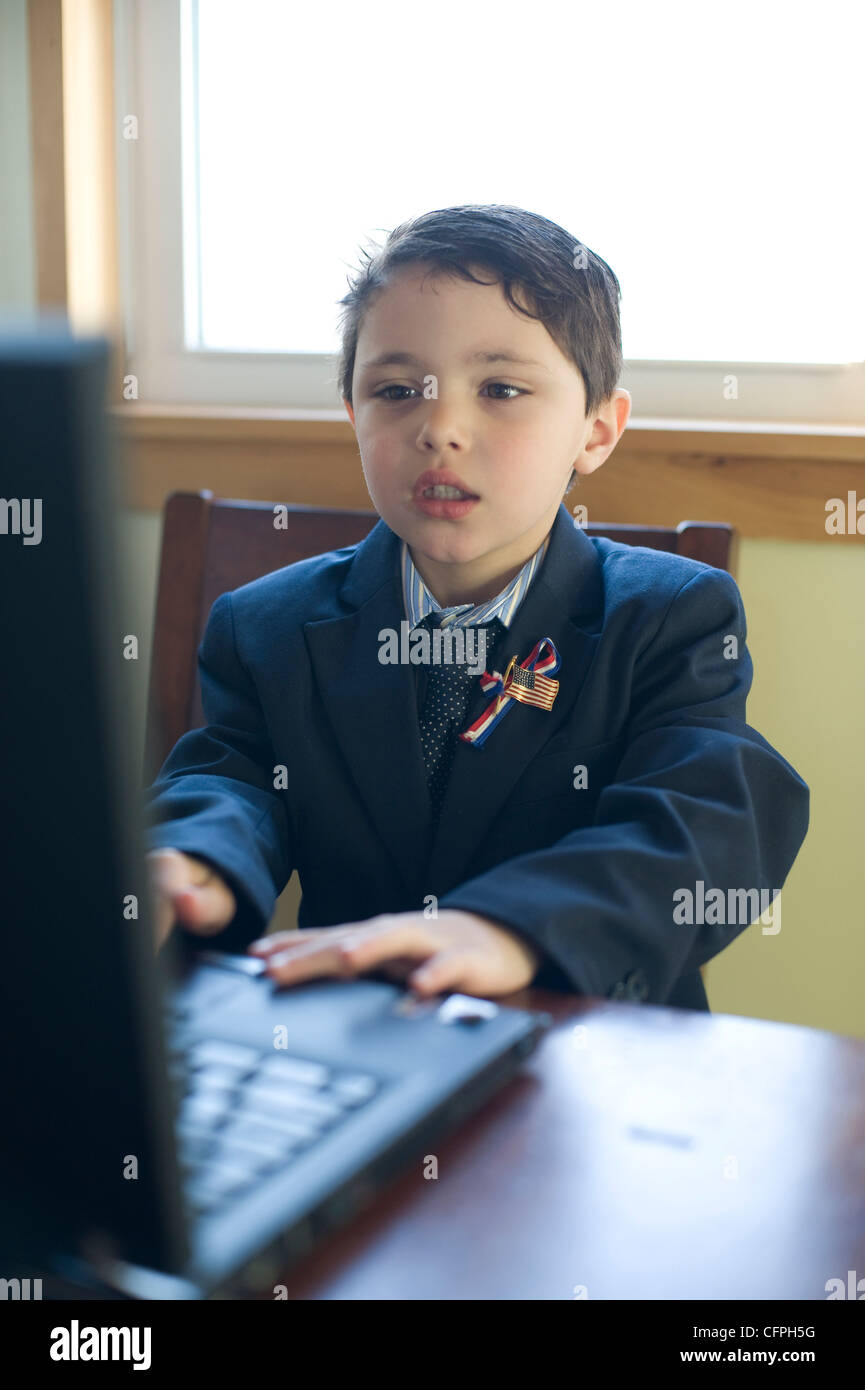 Five year old Hispanic boy formally dressed as a political candidate ...