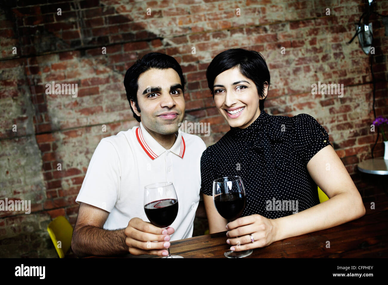 Couple Drinking at Bar Stock Photo - Alamy
