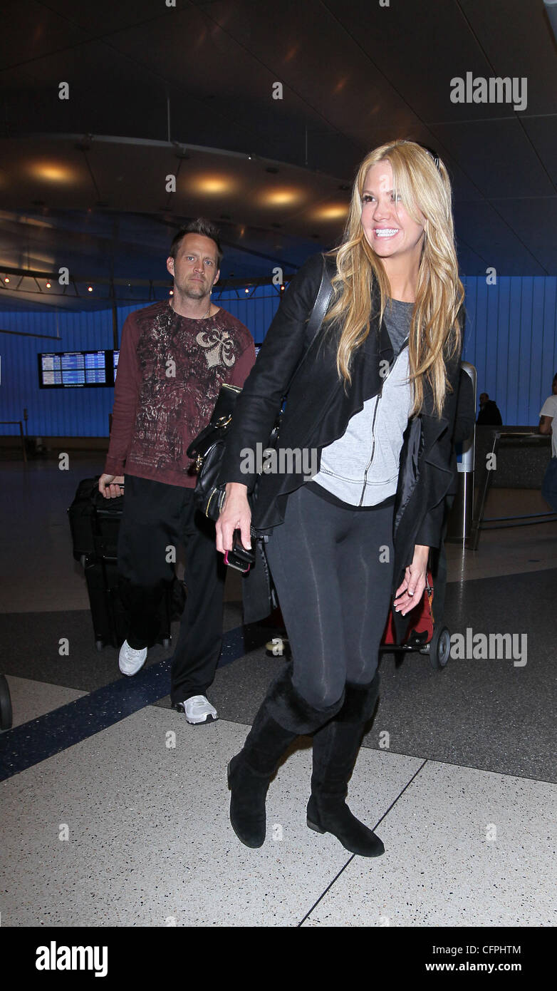 Nancy O'Dell and husband Keith Zubchevich arrive at LAX Los Angeles ...