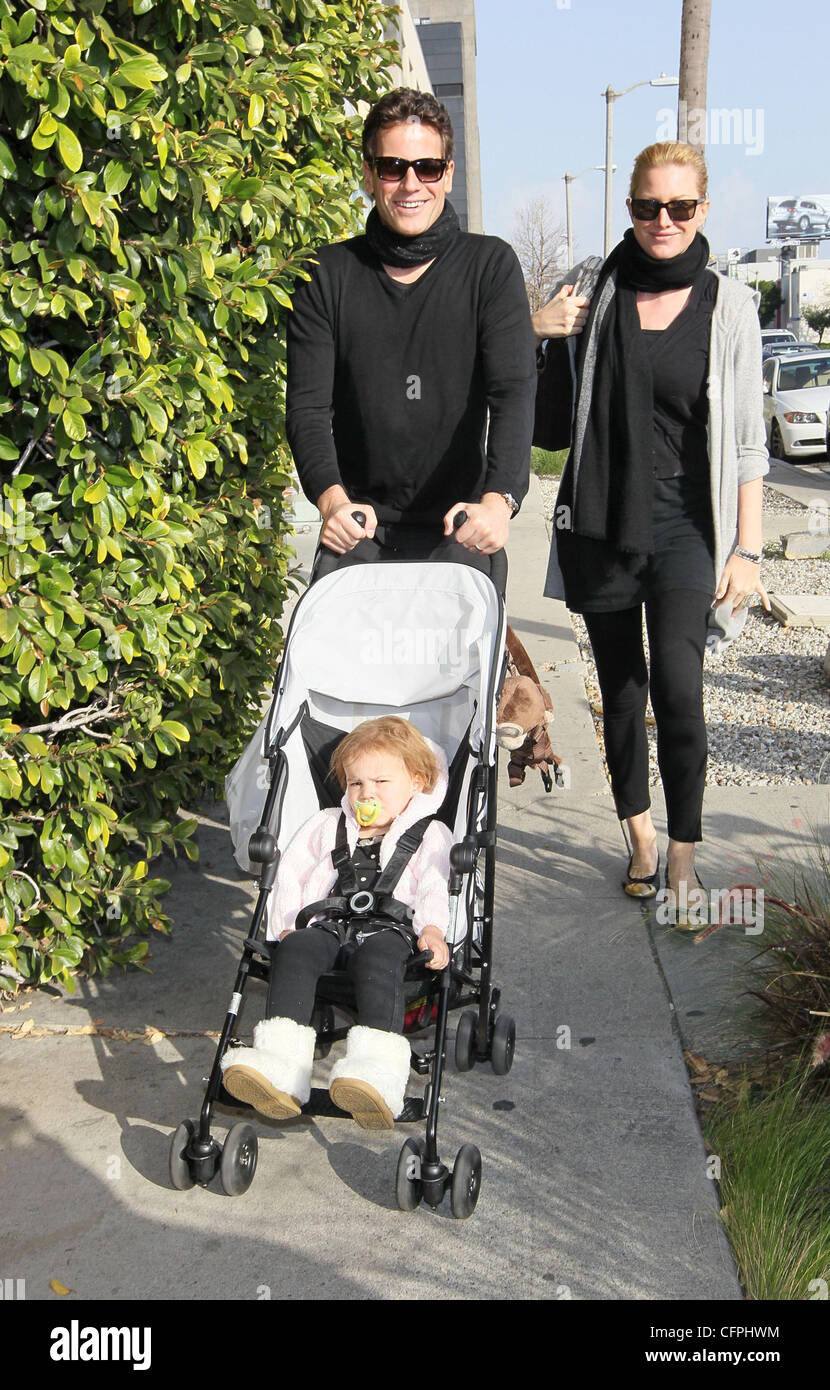 Ioan Gruffudd and Alice Evans with their daughter Ella walking past ...