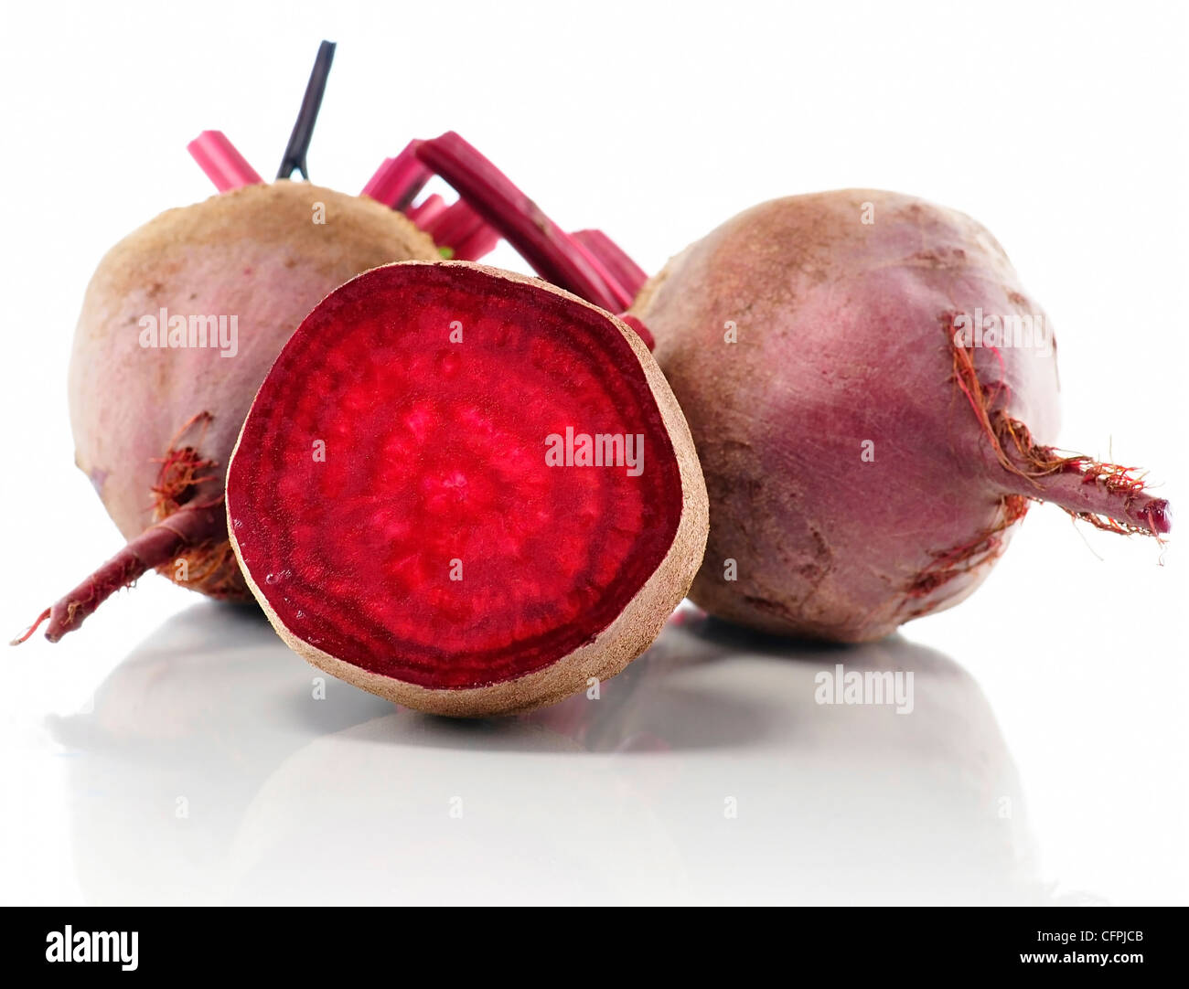 raw beets on white background Stock Photo - Alamy