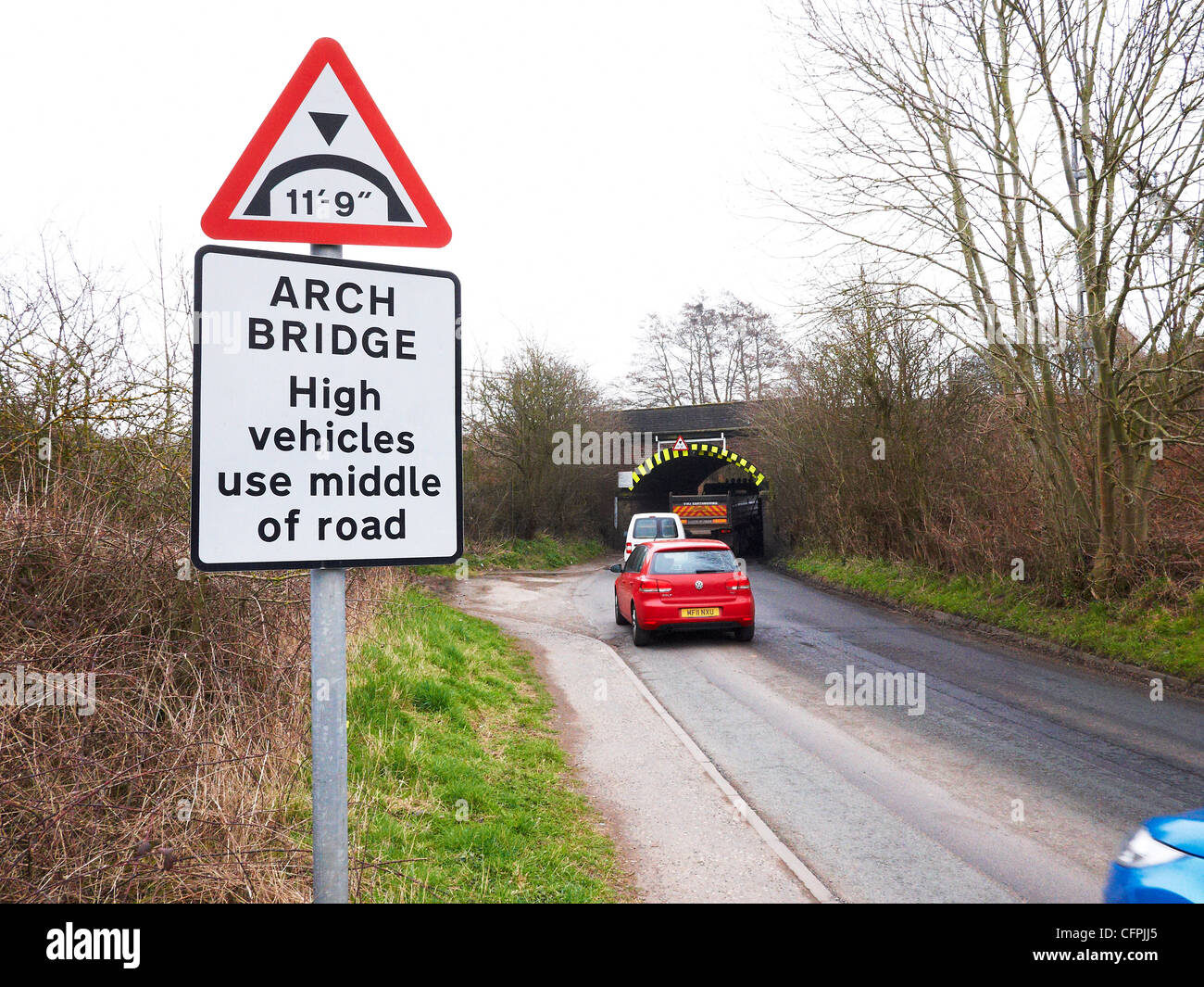 Road sign warning of a low railway bridge Stock Photo - Alamy