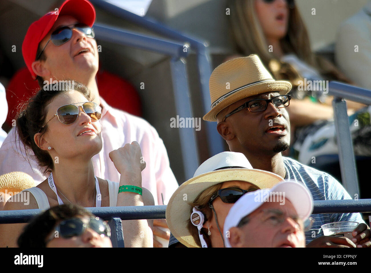 Taye Diggs and Idina Menzel Celebrities watching the men's semifinals ...