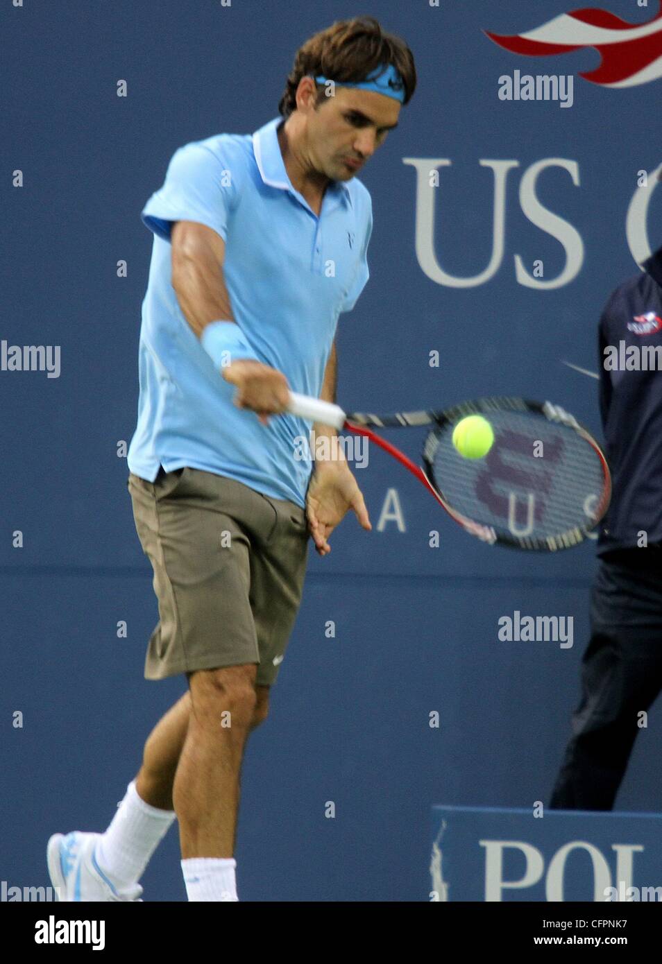 Roger Federer of Switzerland competes in the men's semifinals match on ...