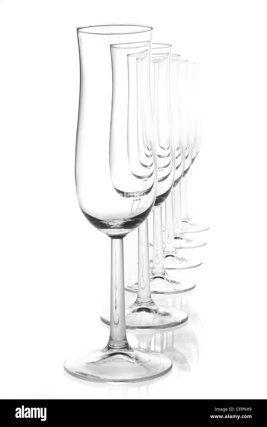 empty champagne flutes on white background Stock Photo - Alamy