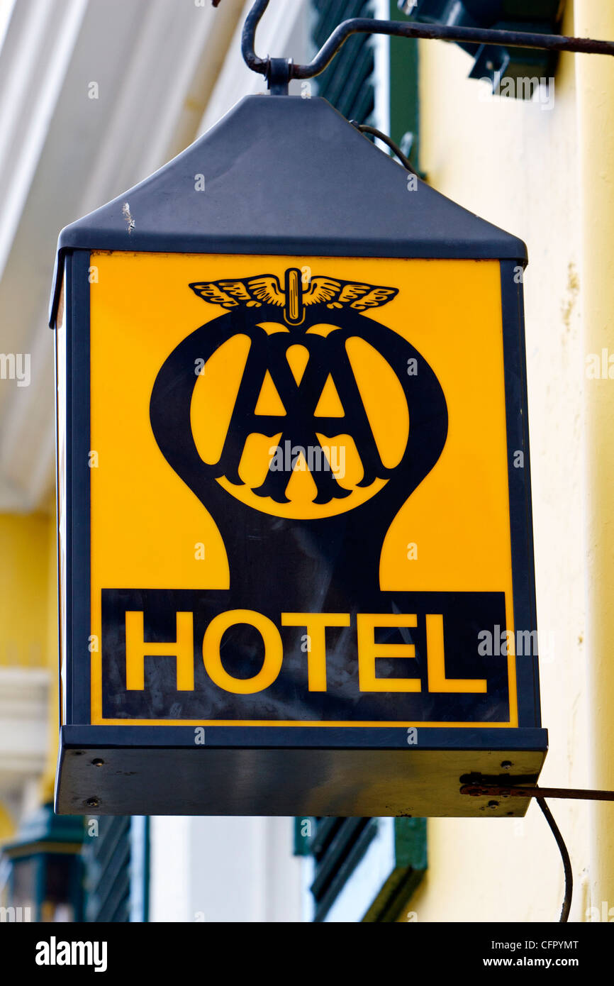 Old AA illuminated sign hung above a hotel entrance Stock Photo - Alamy