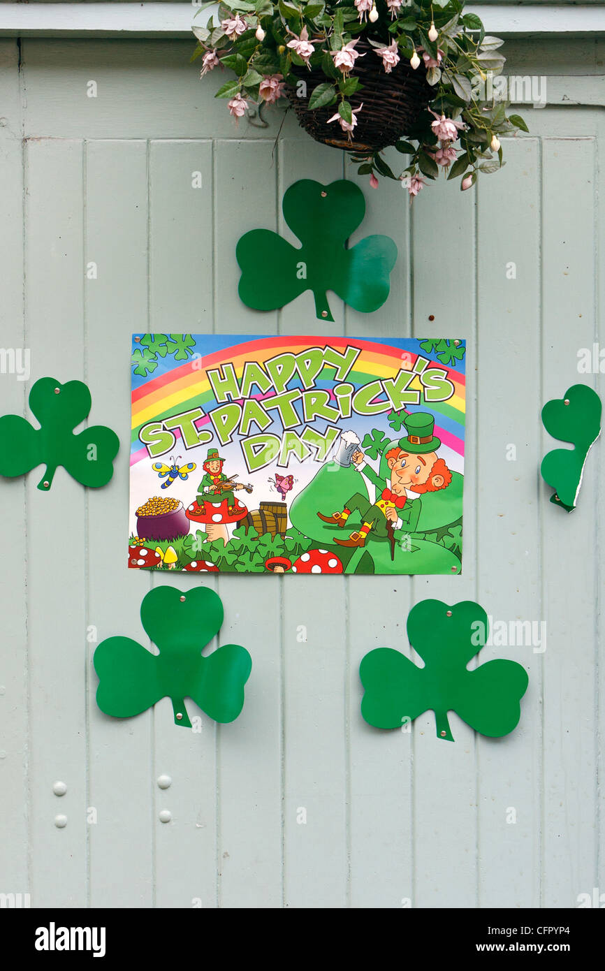 St Patricks day poster and Shamrocks outside a UK pub Stock Photo - Alamy