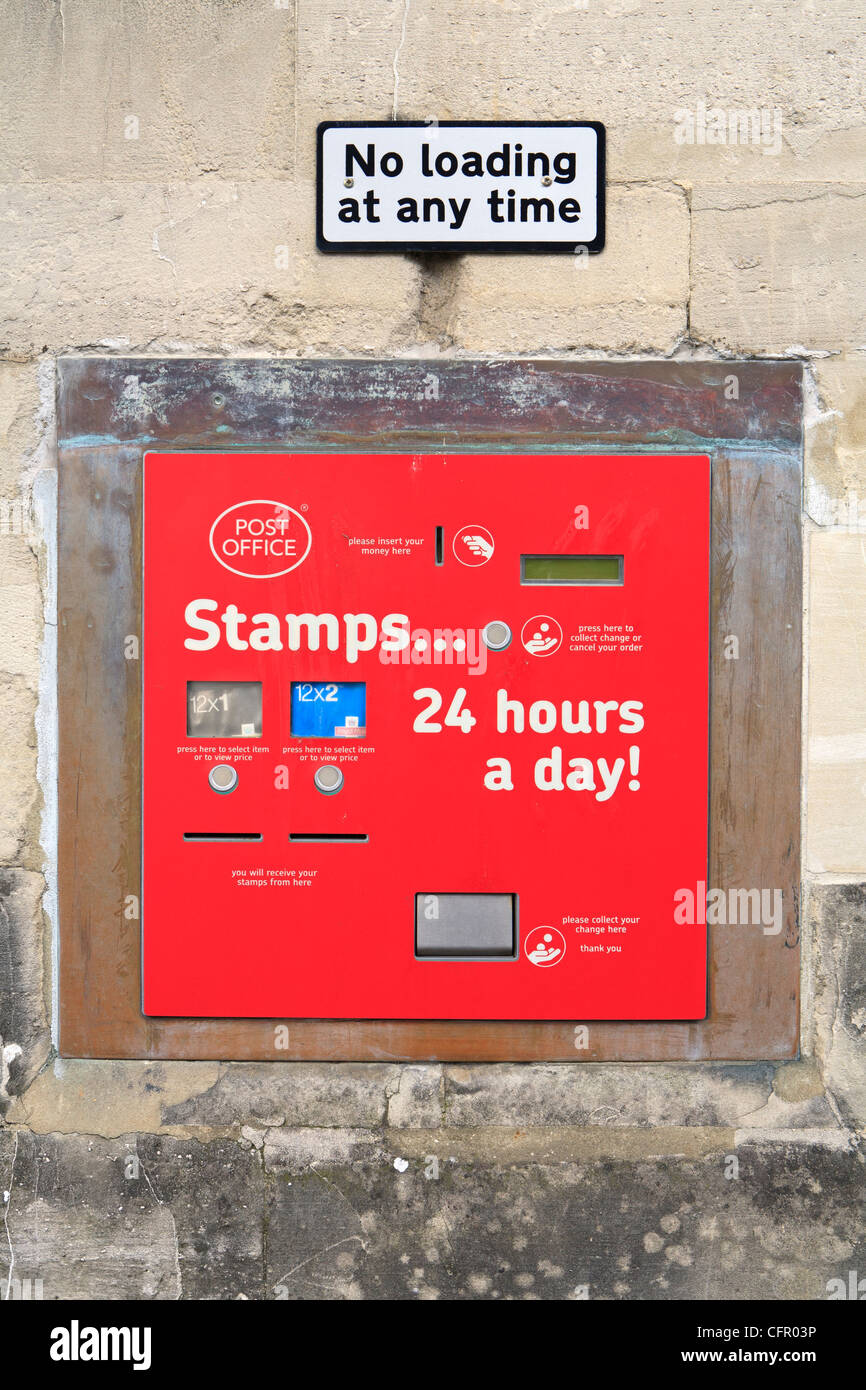 UK postage stamp dispenser Stock Photo - Alamy